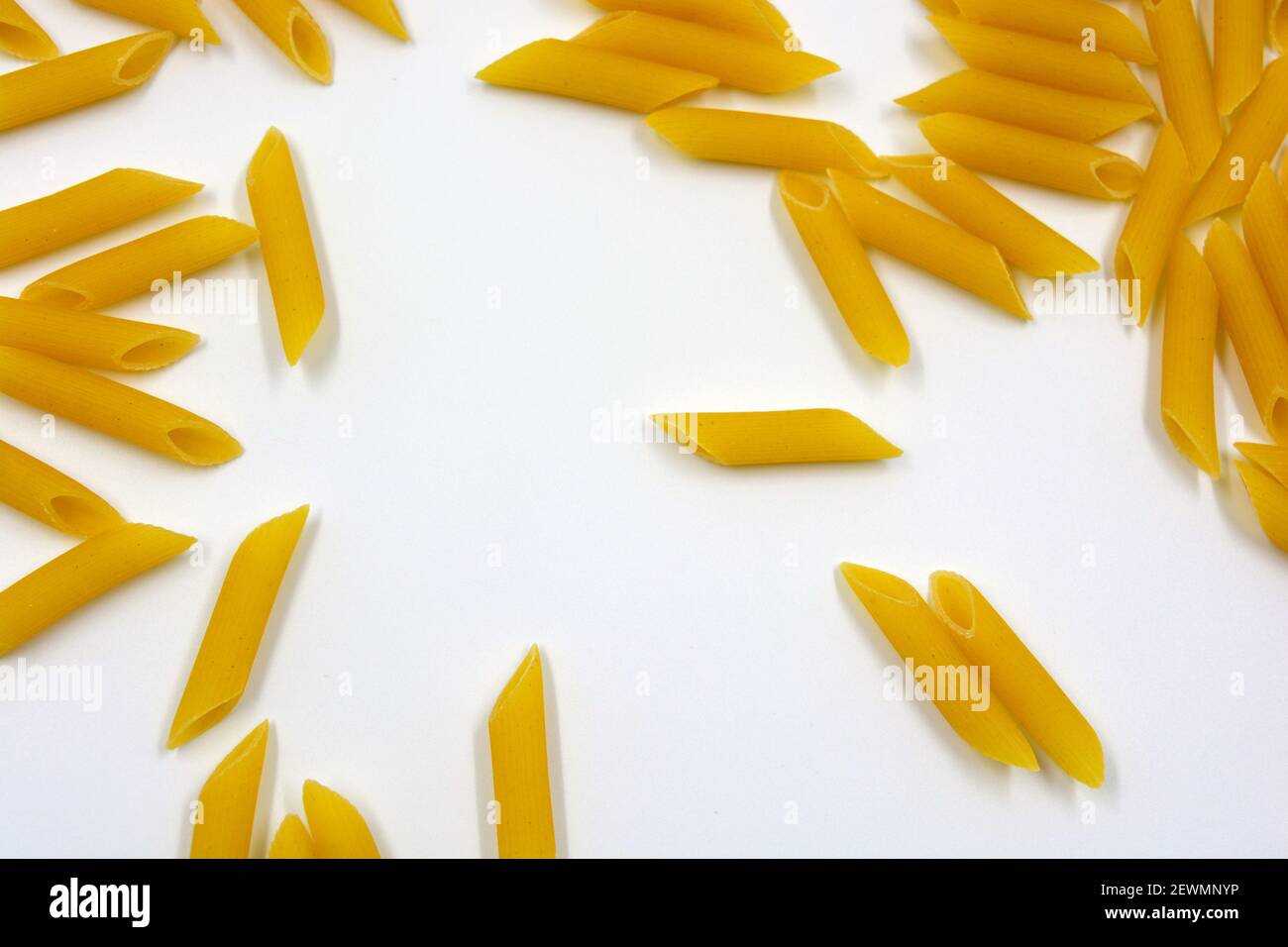 Food dry yellow Italian vermicelli, grain solid paste is located on a ...