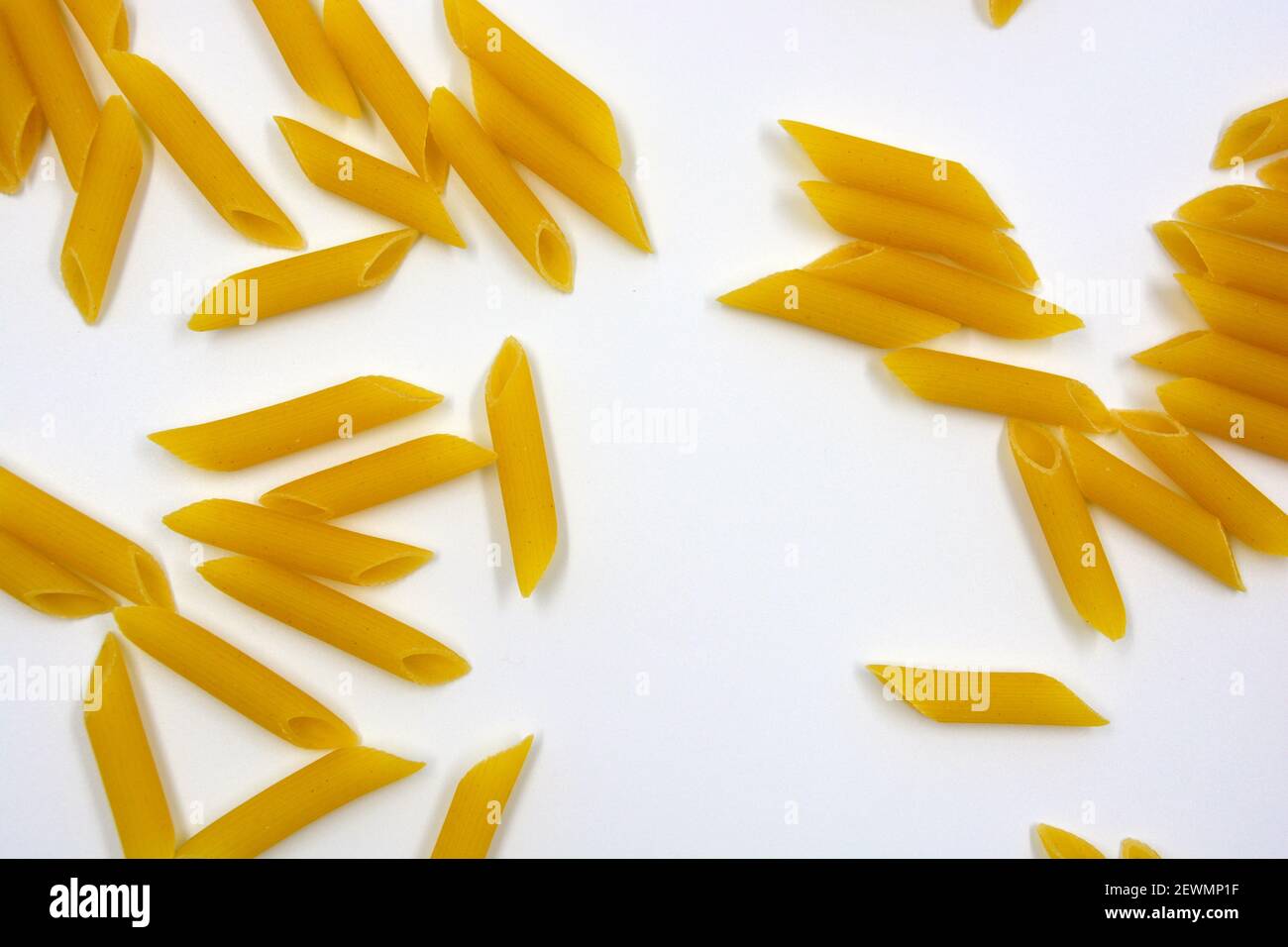 Food dry yellow Italian vermicelli, grain solid paste is located on a ...