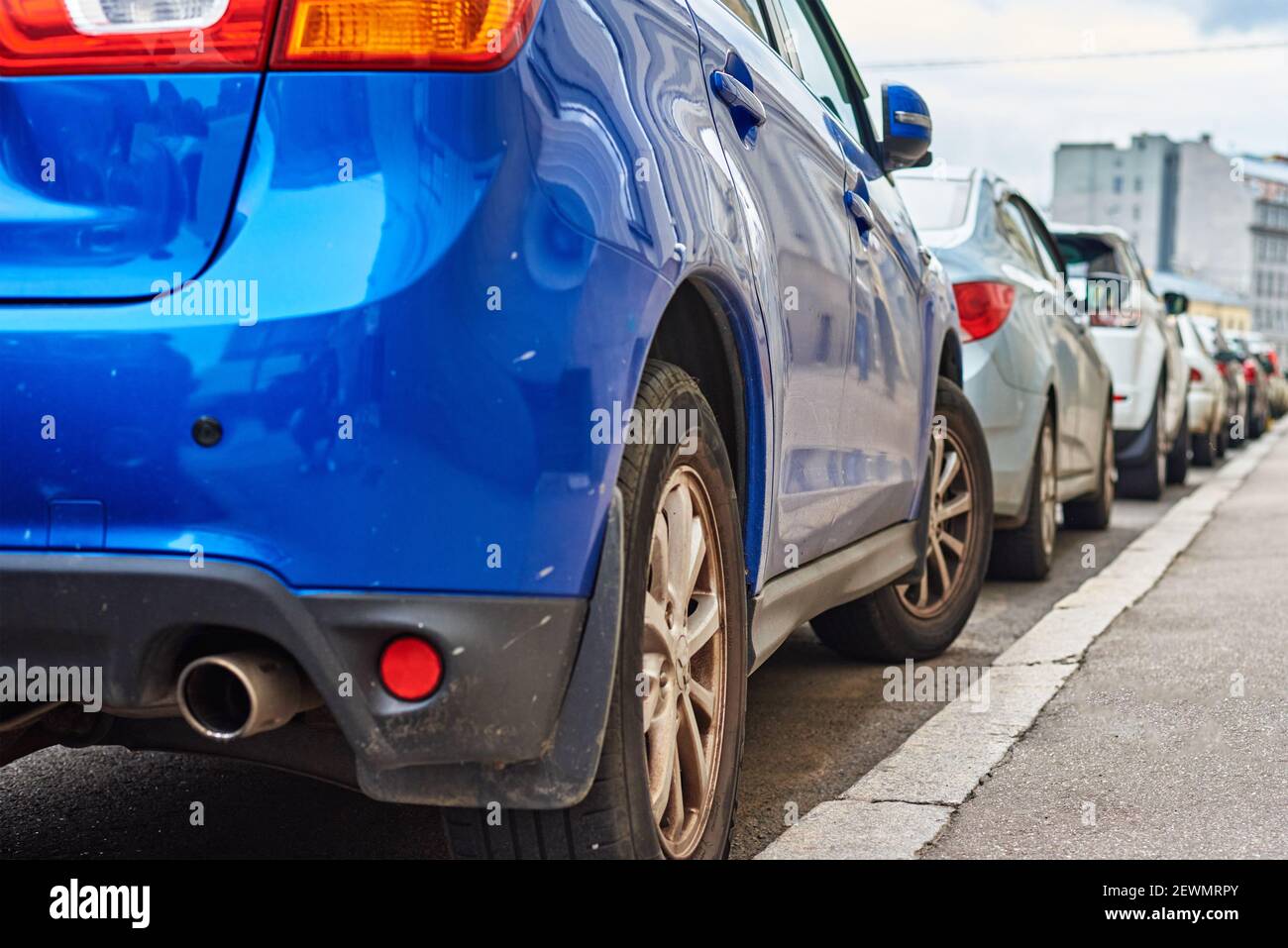 Cars drive along parking lot hi-res stock photography and images - Alamy