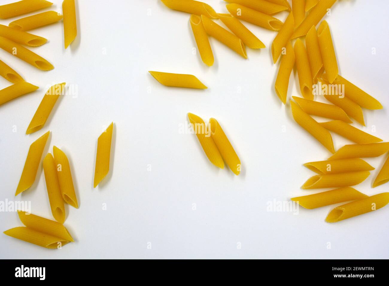 Food dry yellow Italian vermicelli, grain solid paste is located on a ...