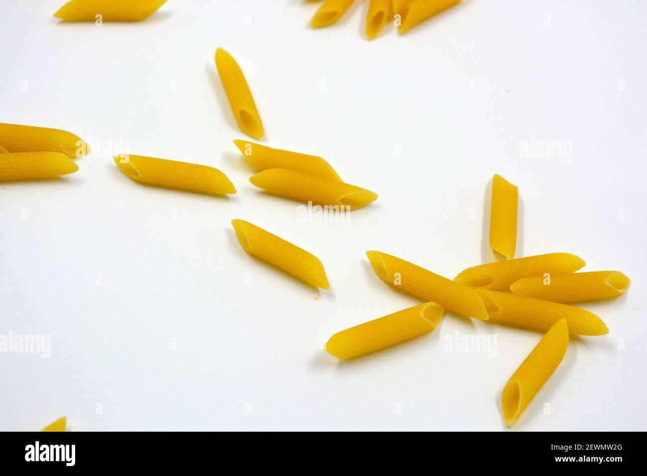 Food dry yellow Italian vermicelli, grain solid paste is located on a ...