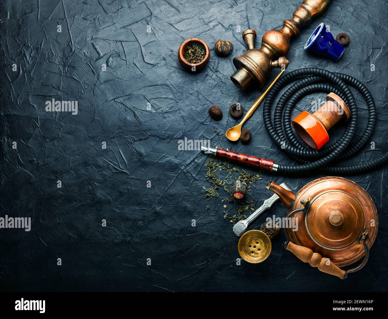 Eastern shisha or hookah for relaxation with a kettle with tea Stock ...