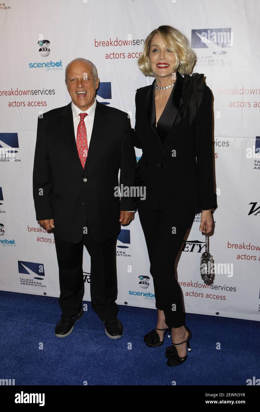 Honoree Chuck Binder and Sharon Stone arrive at the 2016 Talent ...