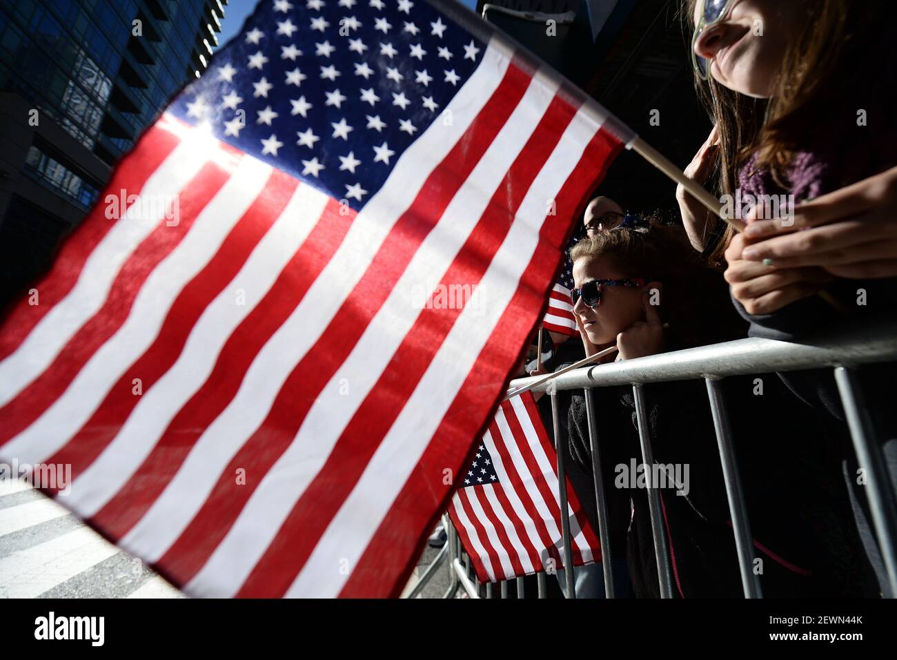 Nine year-old Emily Schorr, from New Jersey, plugs her ears as veterans ...