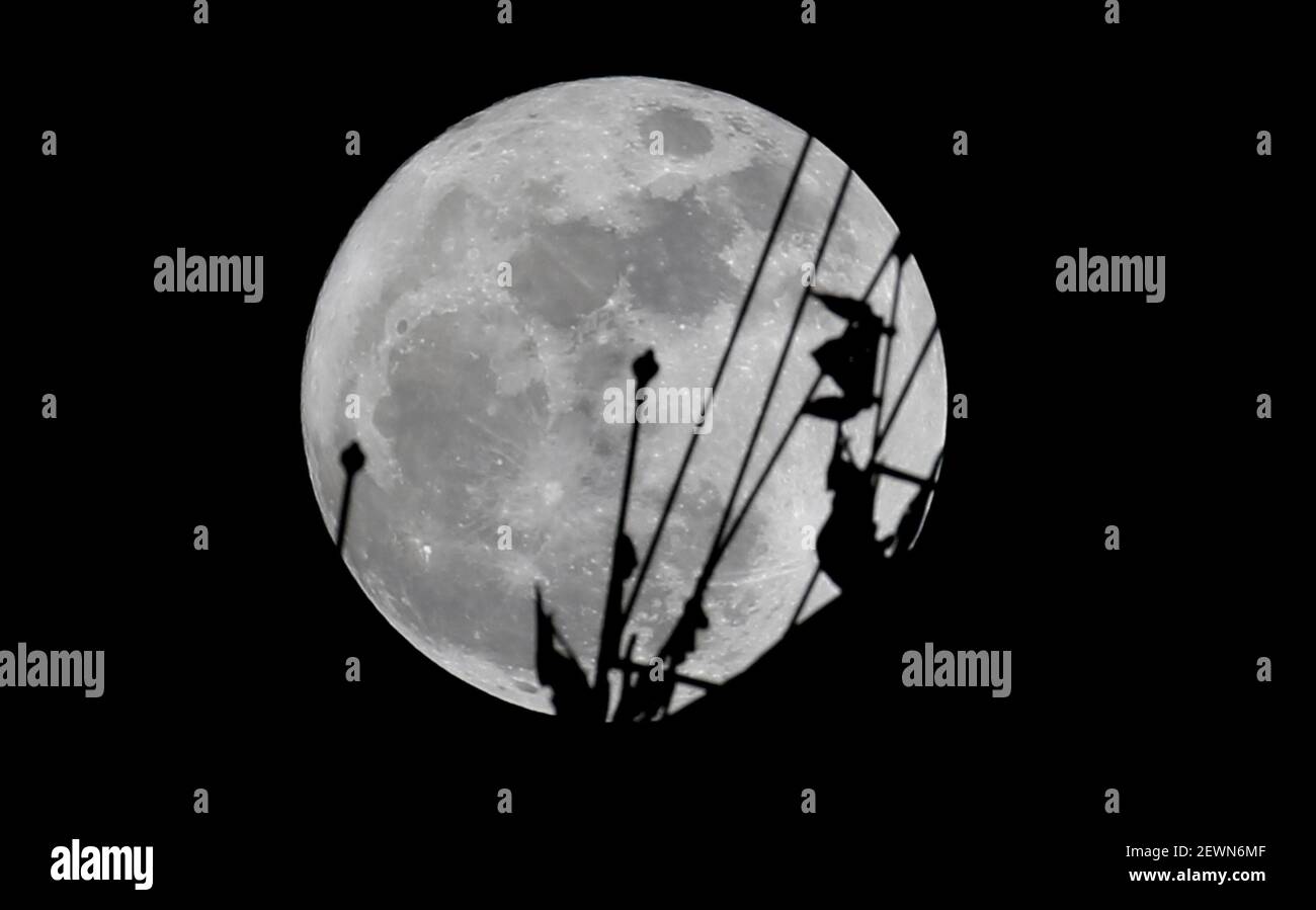 The "supermoon" is seen over Yangon, Myanmar, Nov. 14, 2016 Stock Photo ...