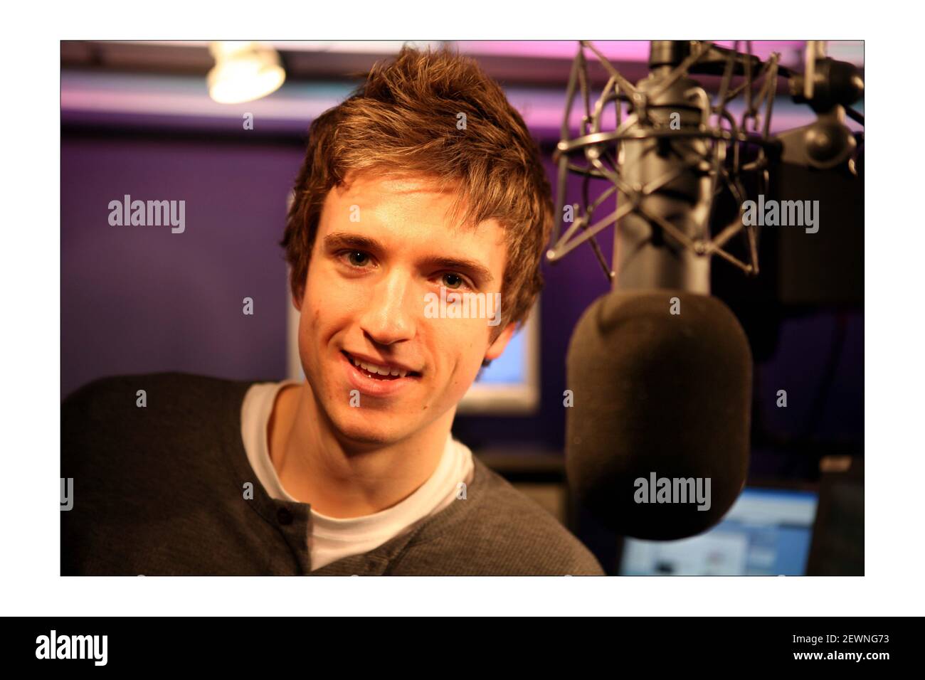 Radio ! early morning DJ Greg James in a studio at bbc radio 1 in ...