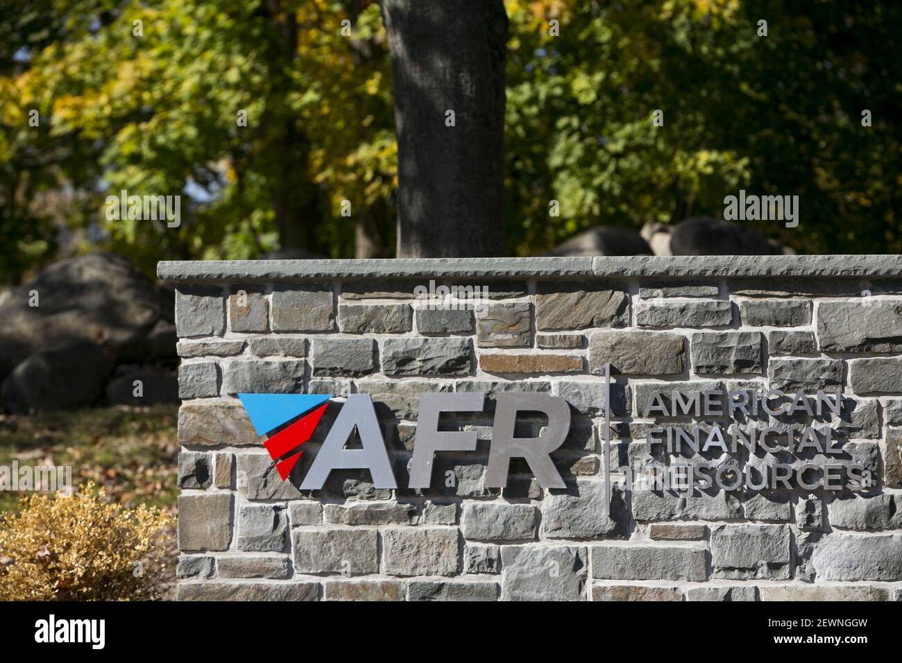 A logo sign outside of the headquarters of eLend and American Financial ...