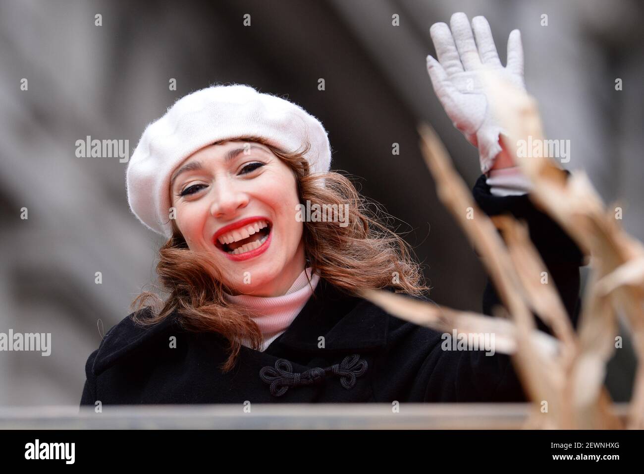 Singer Regina Spektor waves to crowds as she stands on a float during ...