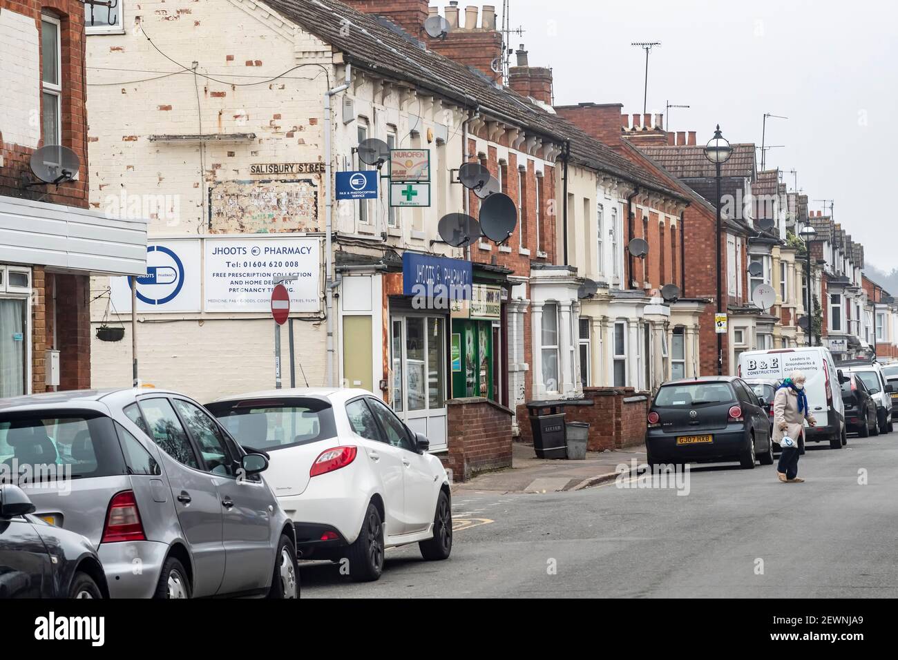 Terrace housing with cars park during lockdown in Semilong road ...