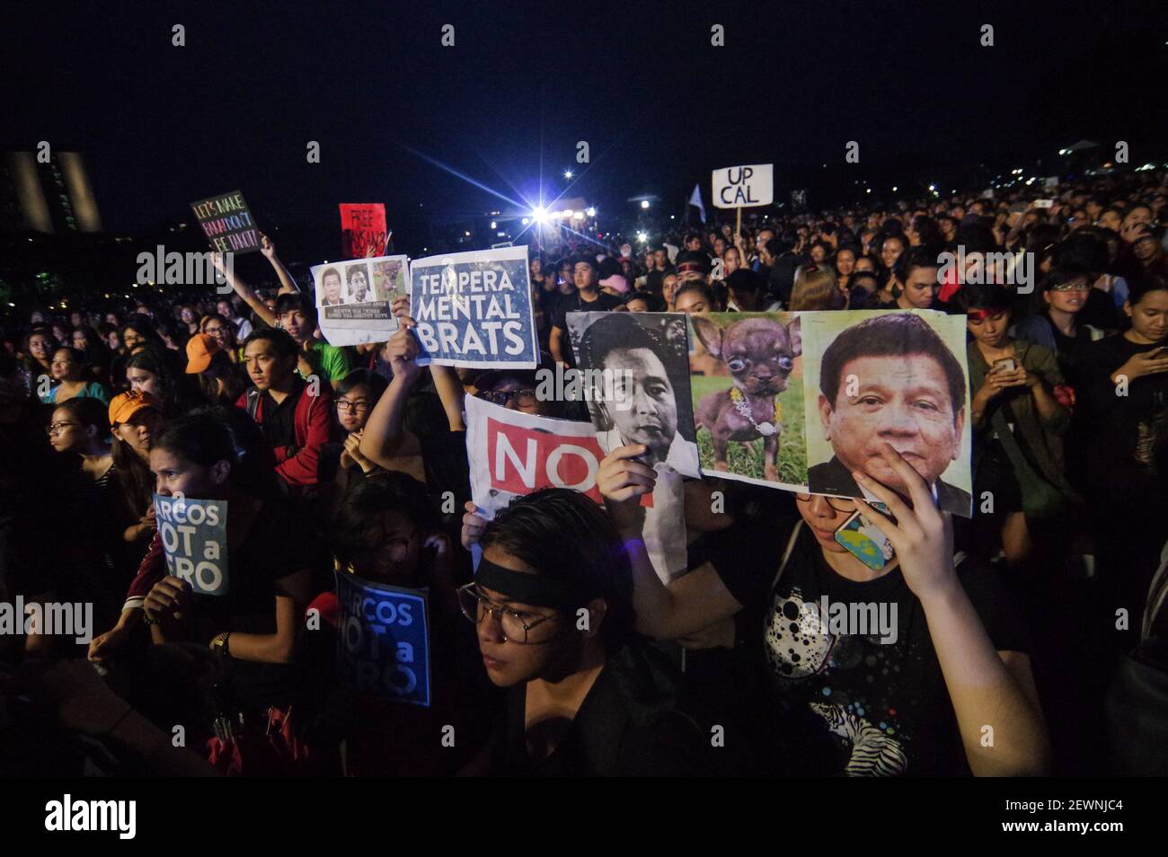 Student activists react with the crowd during the "Black Friday Protest ...