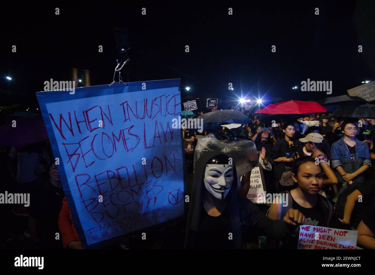 Student activists react with the crowd during the "Black Friday Protest ...