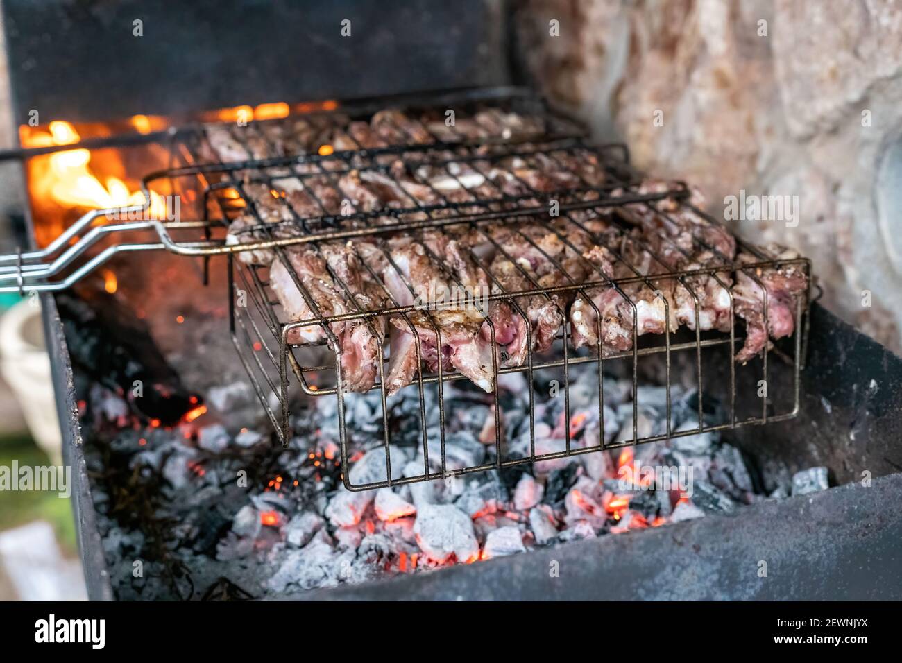 Lamb ribs cooked over an open fire, close-up. Lamb chops Grilling ...