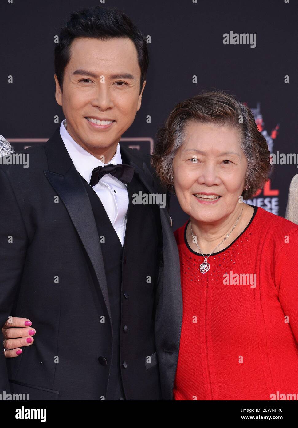 (L-R) Donnie Yen and Mom Bow-Sim Mark at Donnie Yen's Hand & Footprint ...
