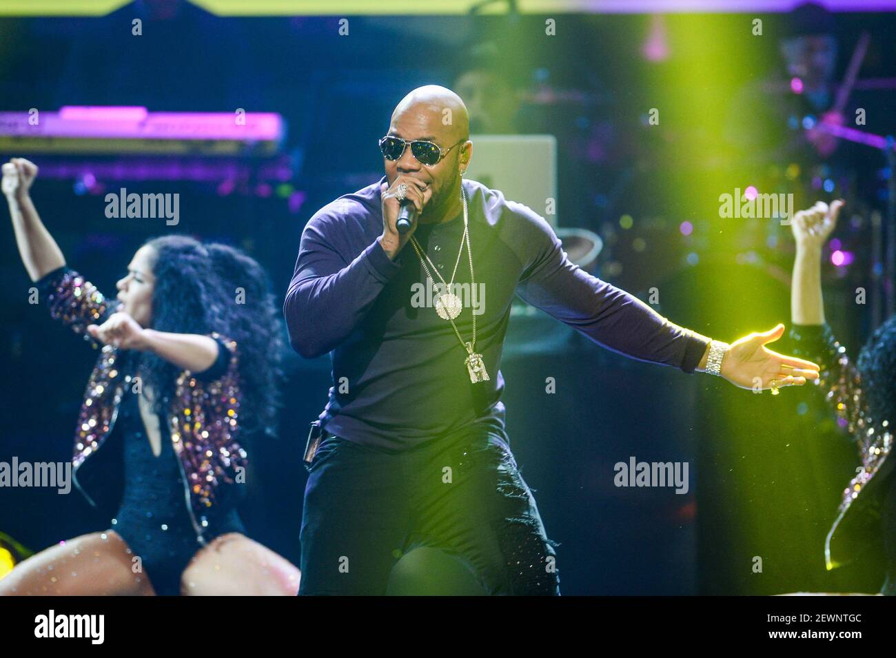 NEW YORK CITY - NOVEMBER 30: Flo Rida with dancers Julissa Pagan ...