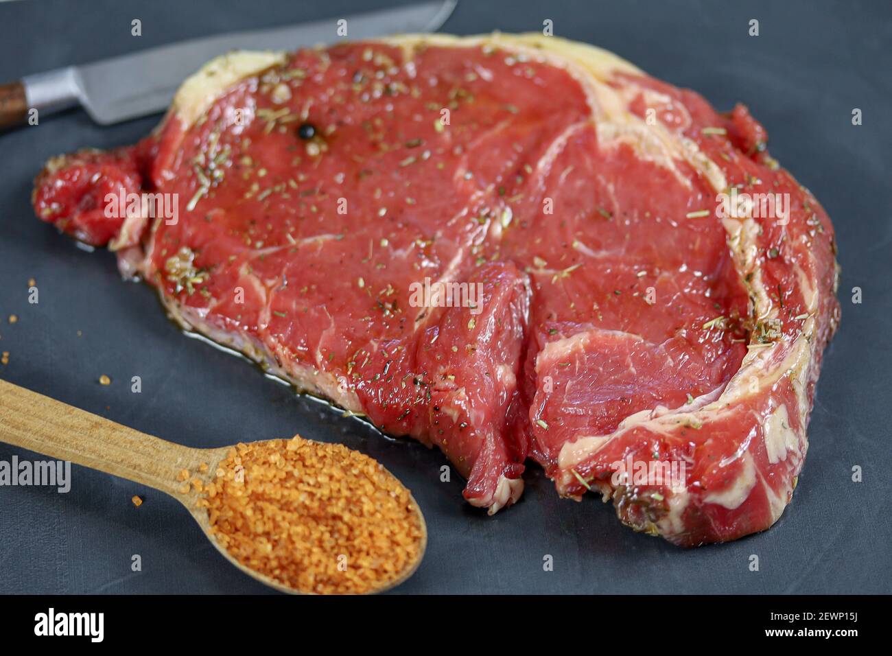 marinated raw beef steak Stock Photo - Alamy