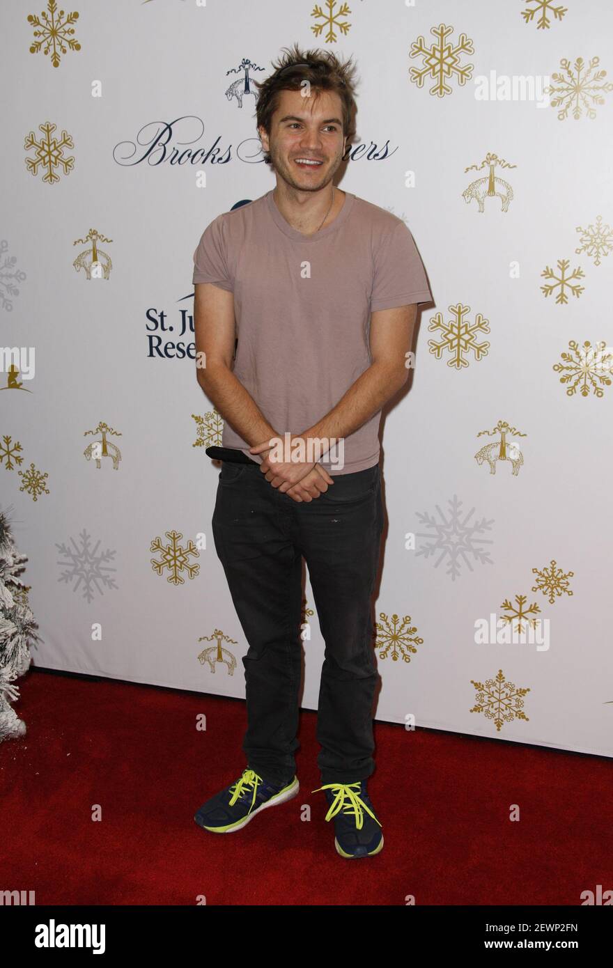 Actor Emile Hirsch arrives at the Brooks Brothers Annual Holiday Party ...