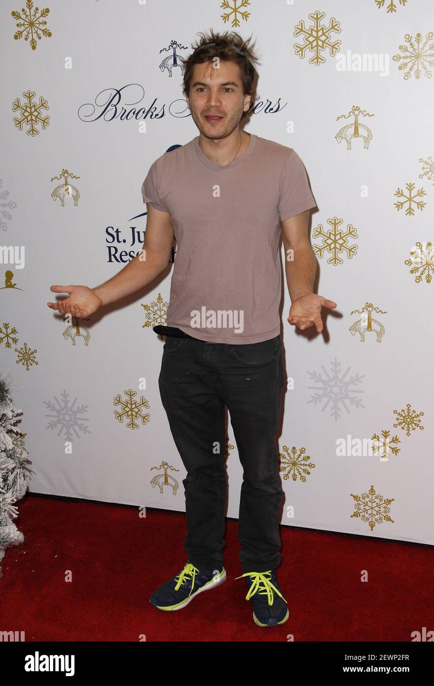 Actor Emile Hirsch arrives at the Brooks Brothers Annual Holiday Party ...
