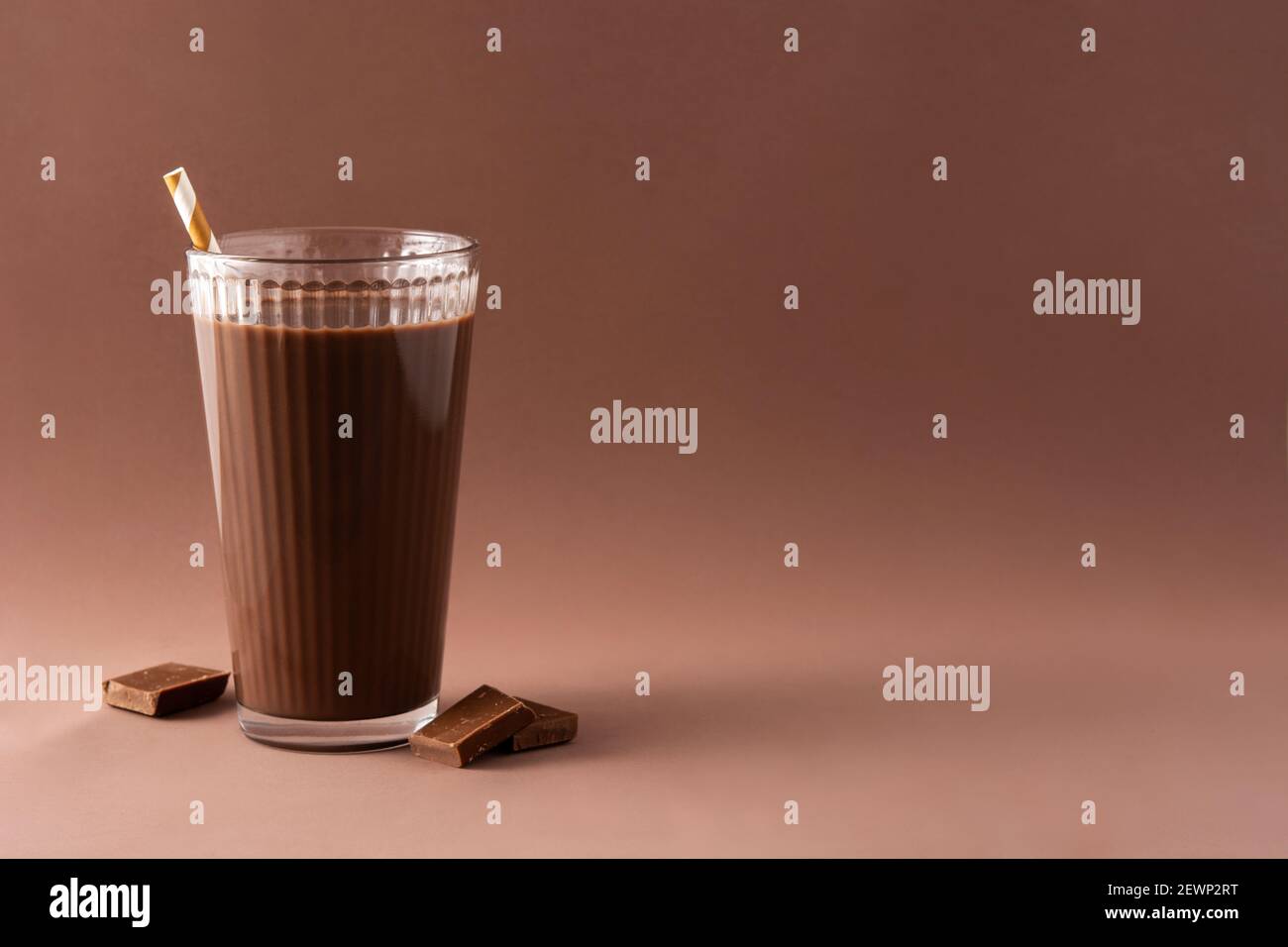 Chocolate milkshake on brown background Stock Photo - Alamy