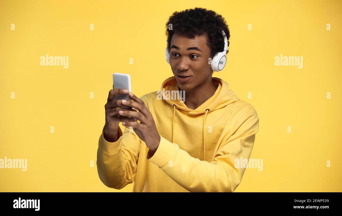 Black teen boy smartphone hi-res stock photography and images - Alamy