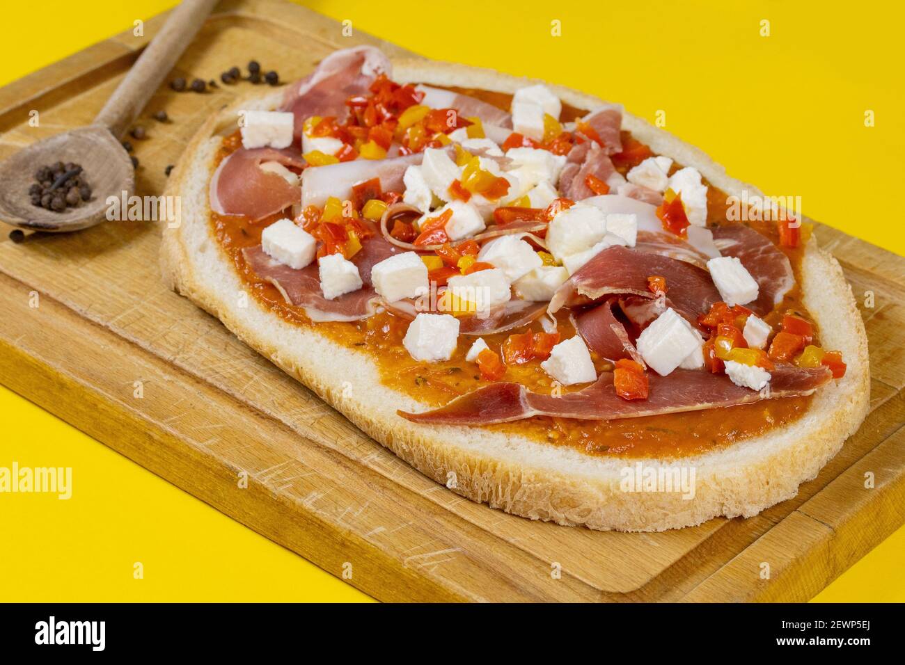 toast of bread with raw ham Stock Photo - Alamy