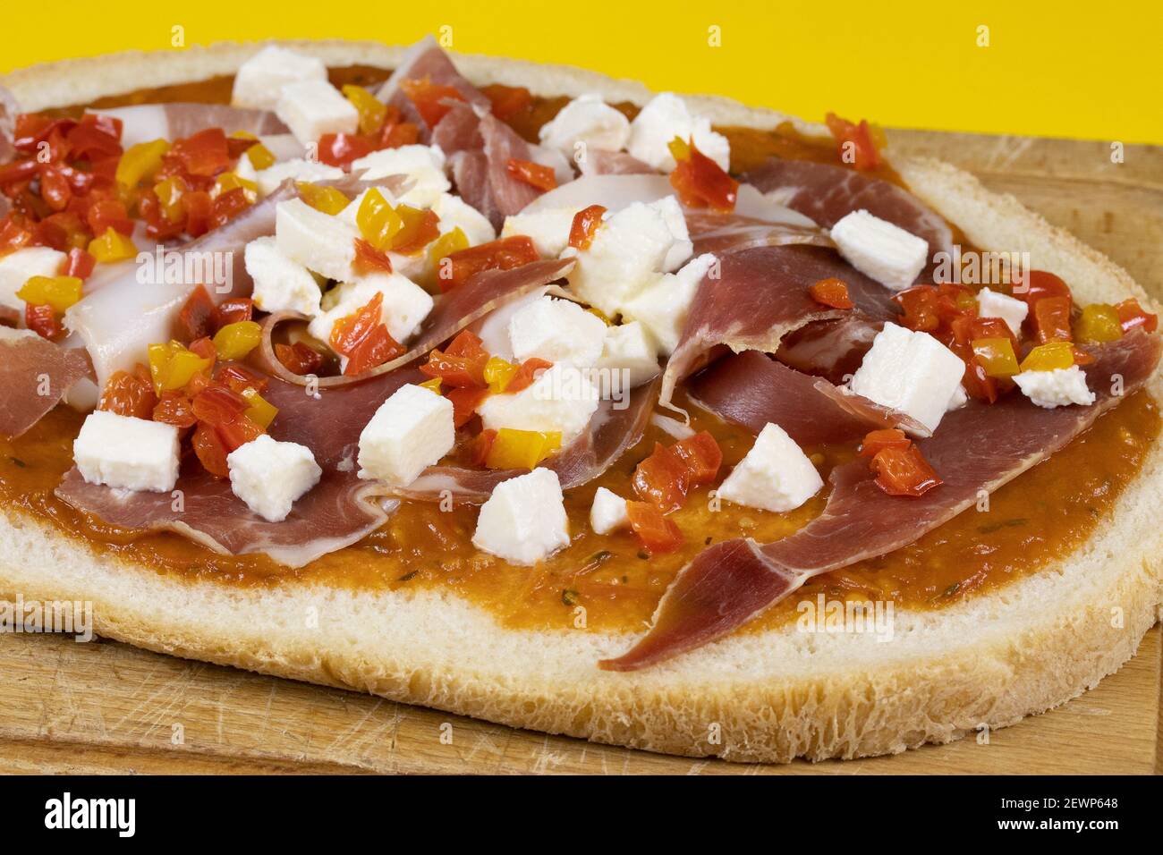 toast of bread with raw ham Stock Photo - Alamy