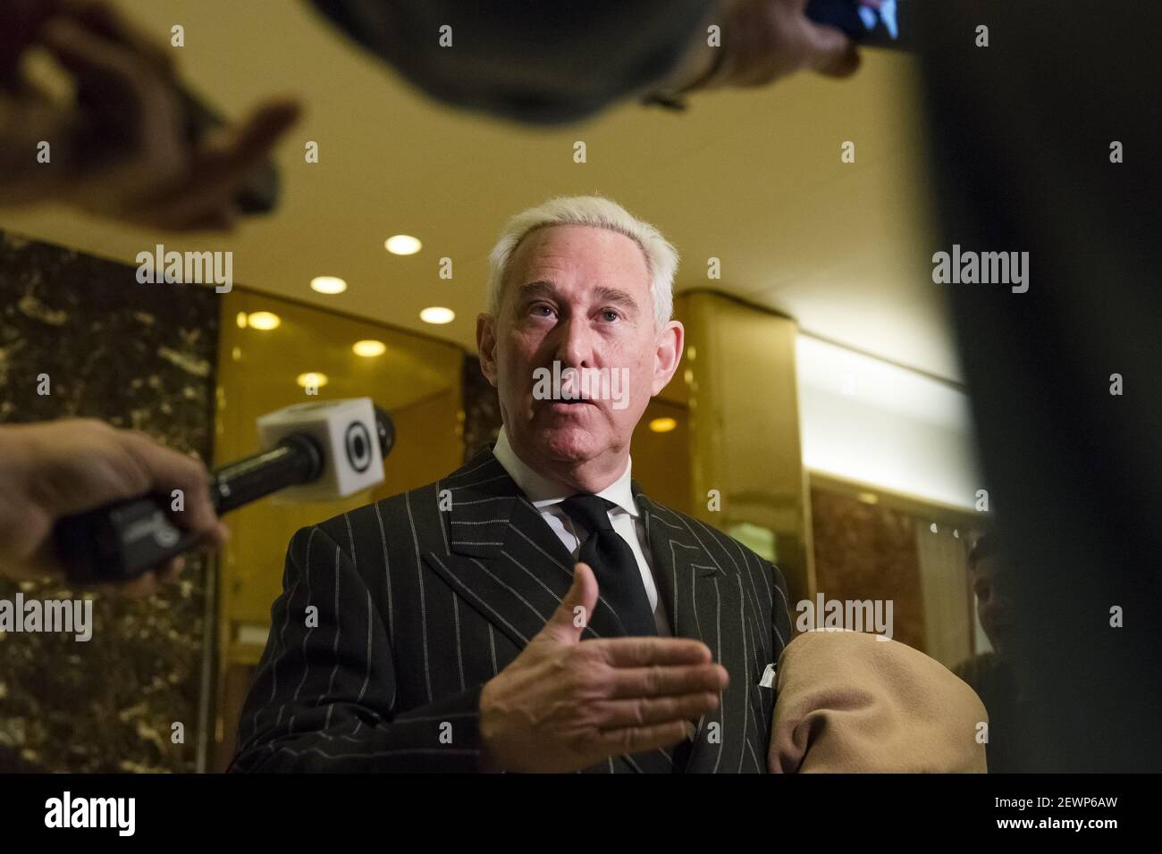 Conservative lobbyist and consultant Roger Stone speaks with the press ...