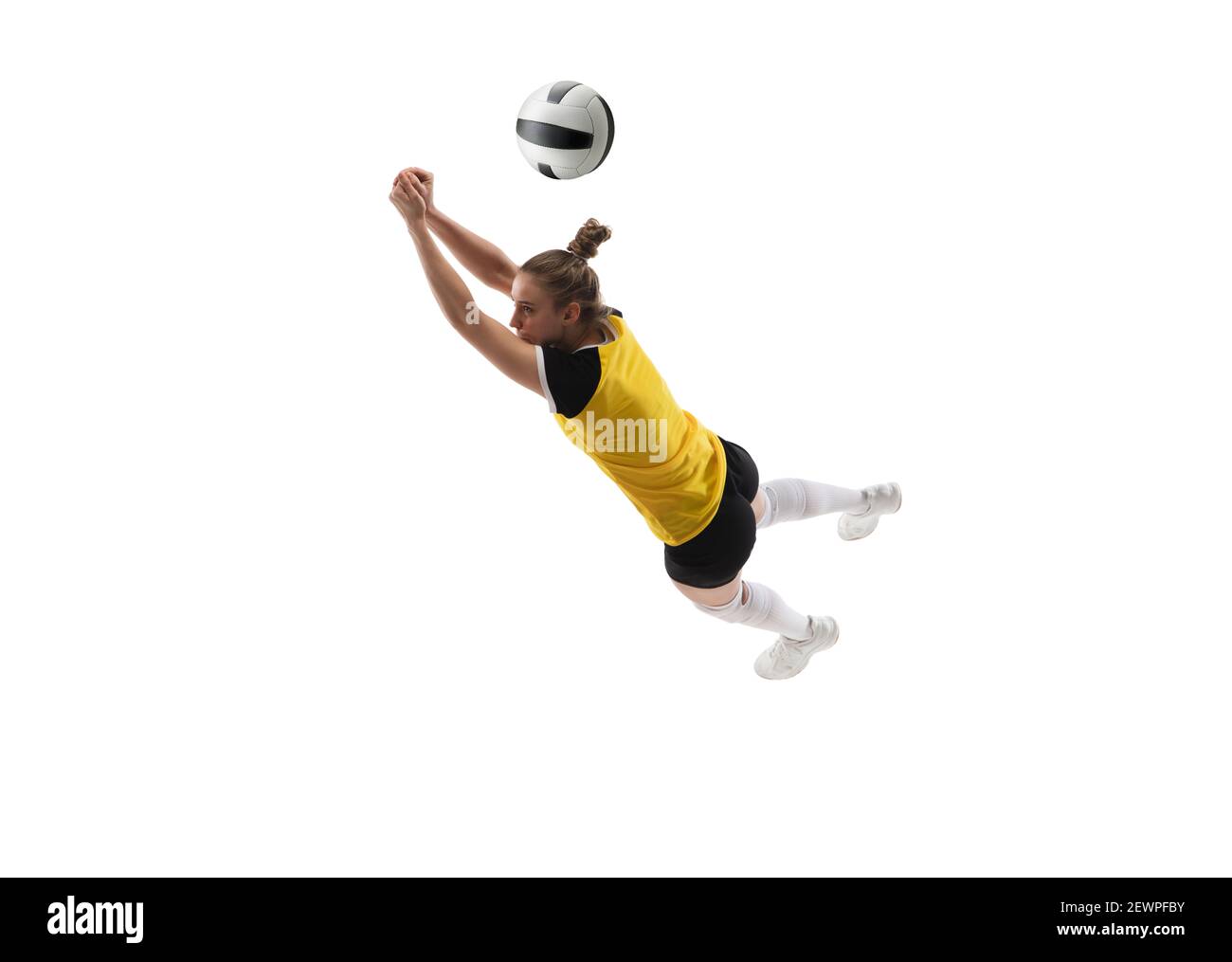 Flying. Young female volleyball player isolated on white studio ...