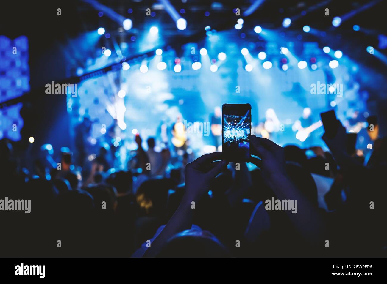 Man recording during event hi-res stock photography and images - Alamy