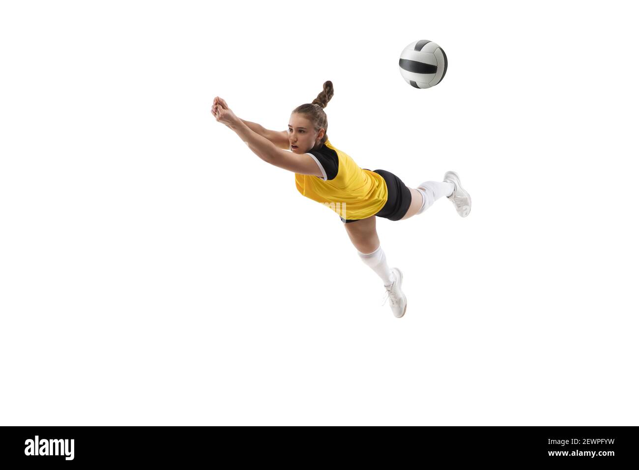 Flying. Young female volleyball player isolated on white studio ...