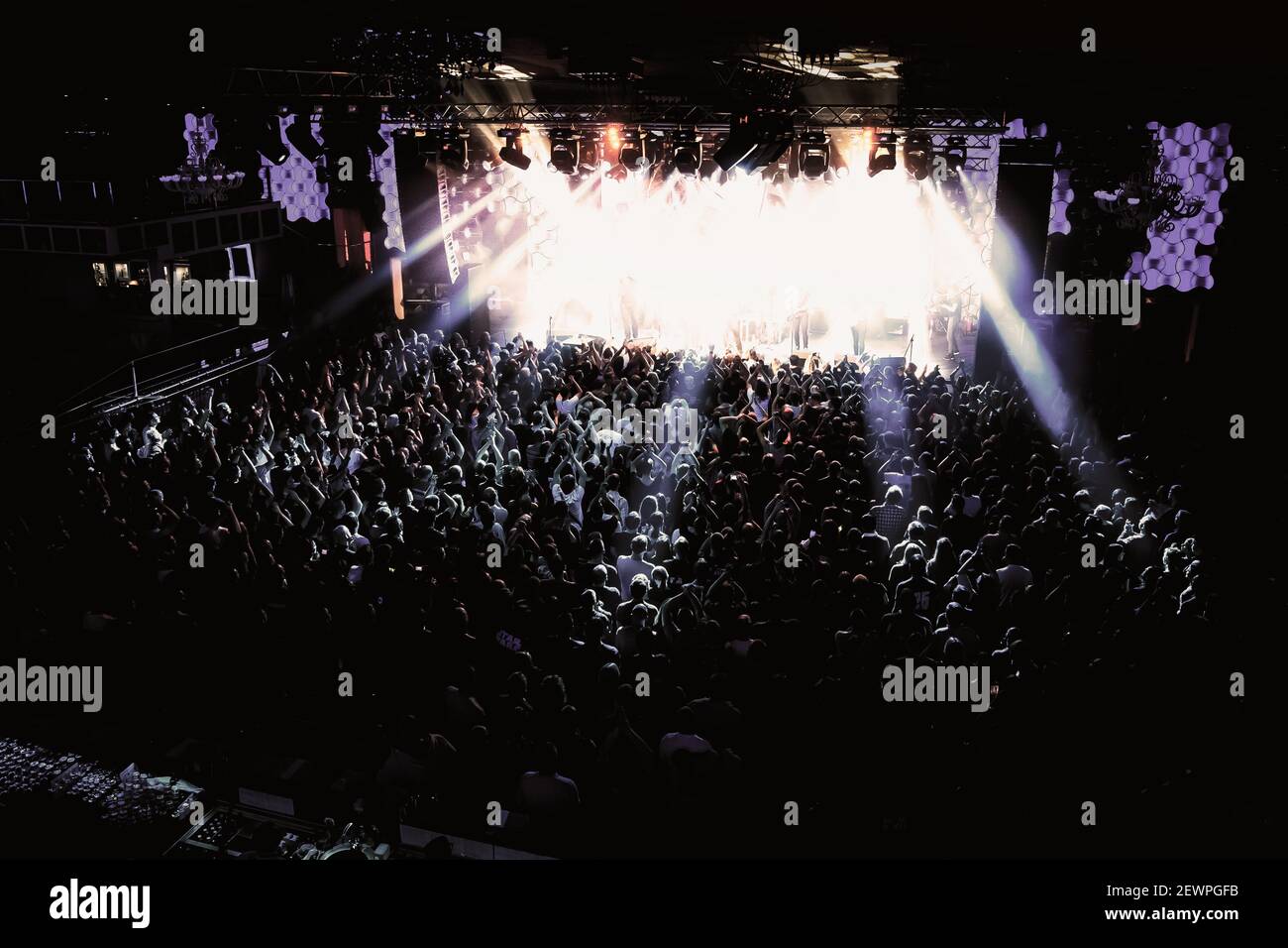 People at a public event. Gathering in concert hall Stock Photo - Alamy