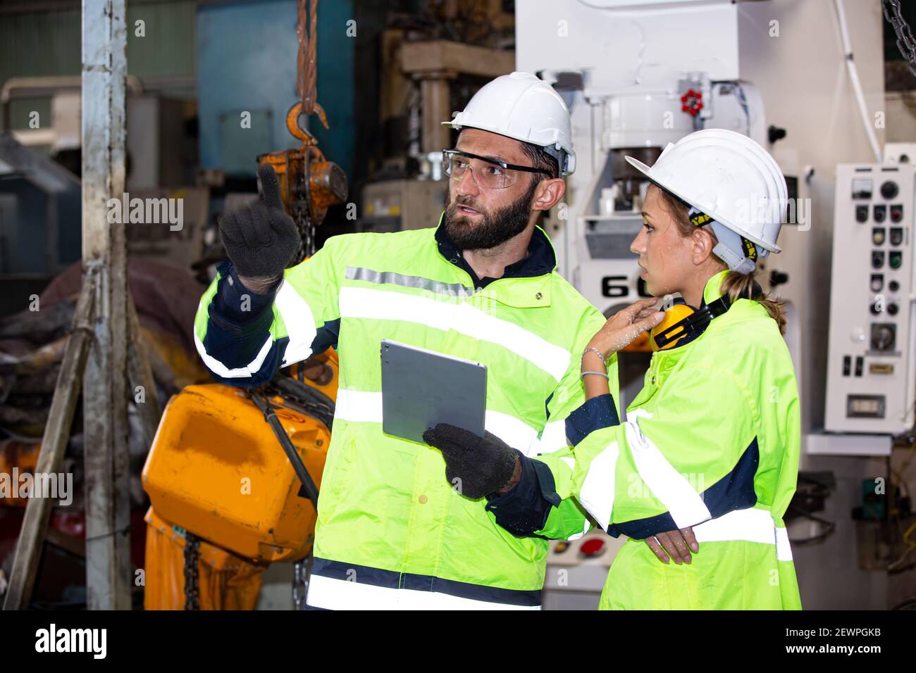 Portrait woman worker and engineer under inspection and checking ...