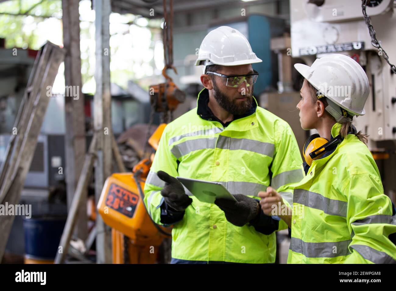Portrait woman worker and engineer under inspection and checking ...