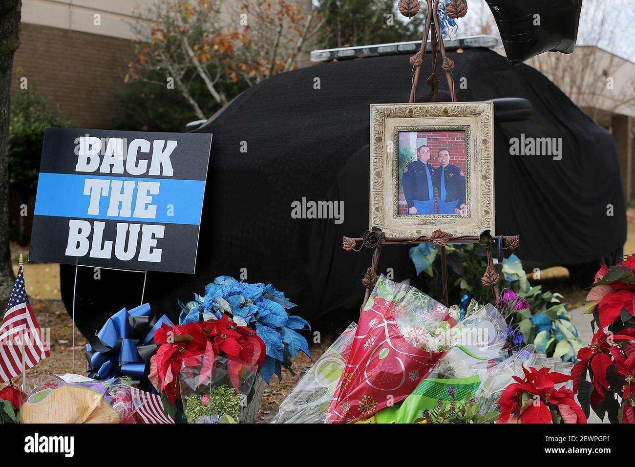 A memorial for Americus police officer Nicholas Ryan Smarr, his patrol ...