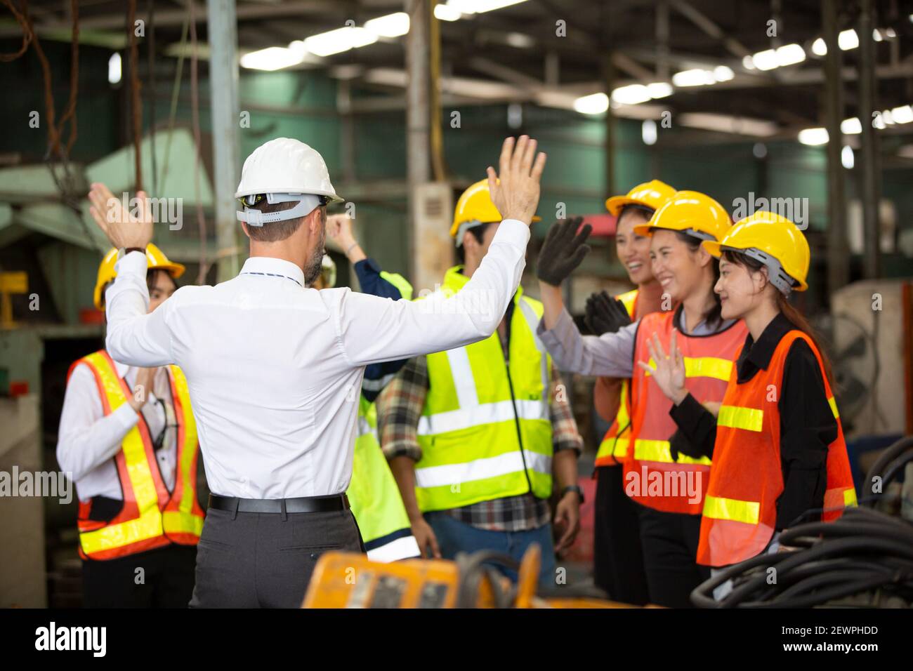 group of workers, change of workers in the factory, people go in ...