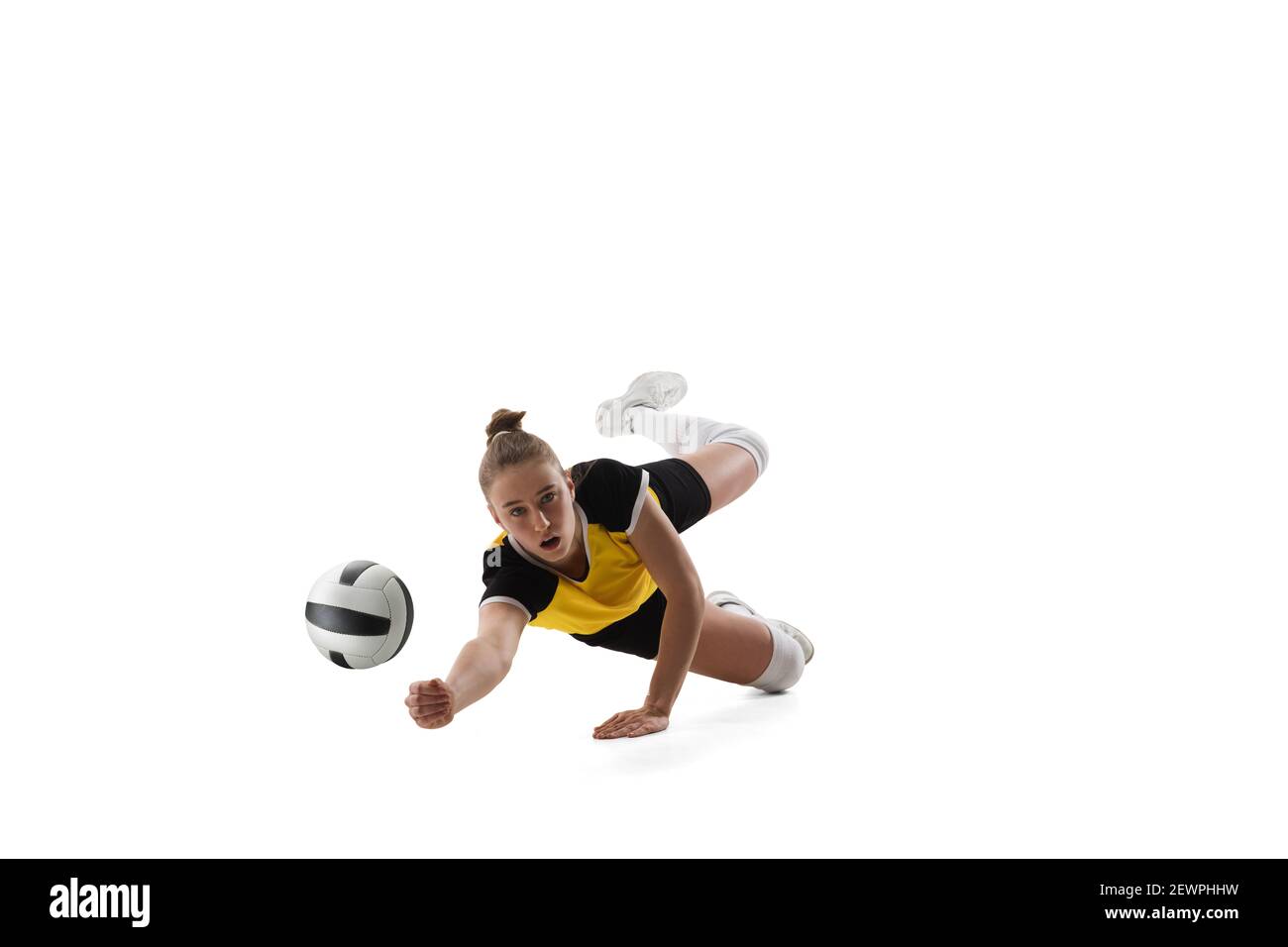 Catching. Young female volleyball player isolated on white studio ...