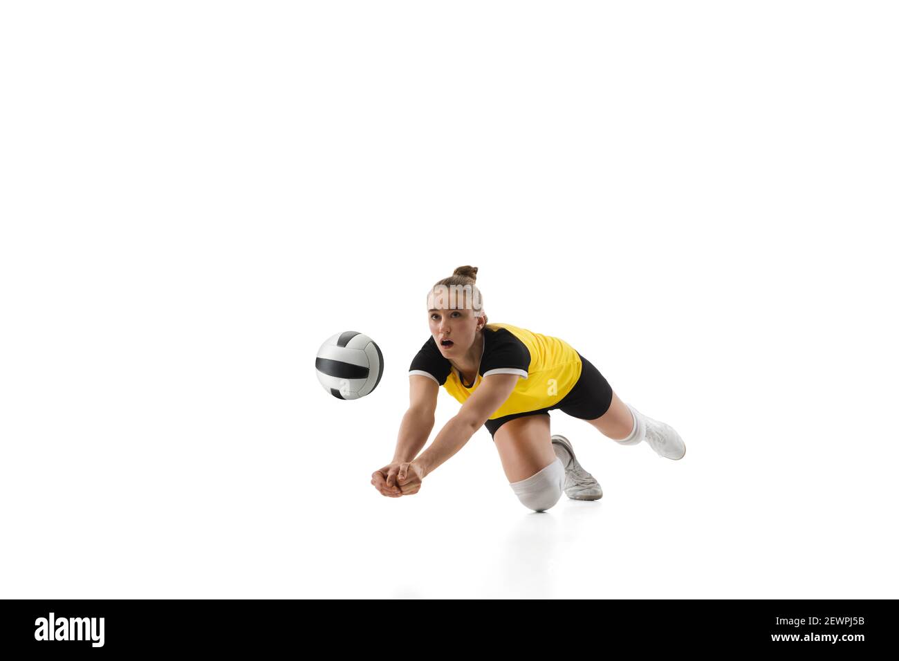 Catching. Young female volleyball player isolated on white studio ...