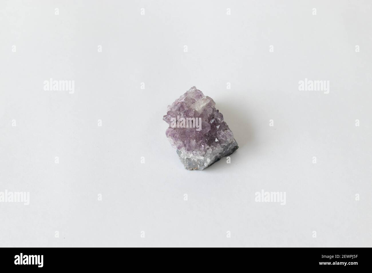 An amethyst isolated on a white background Stock Photo - Alamy