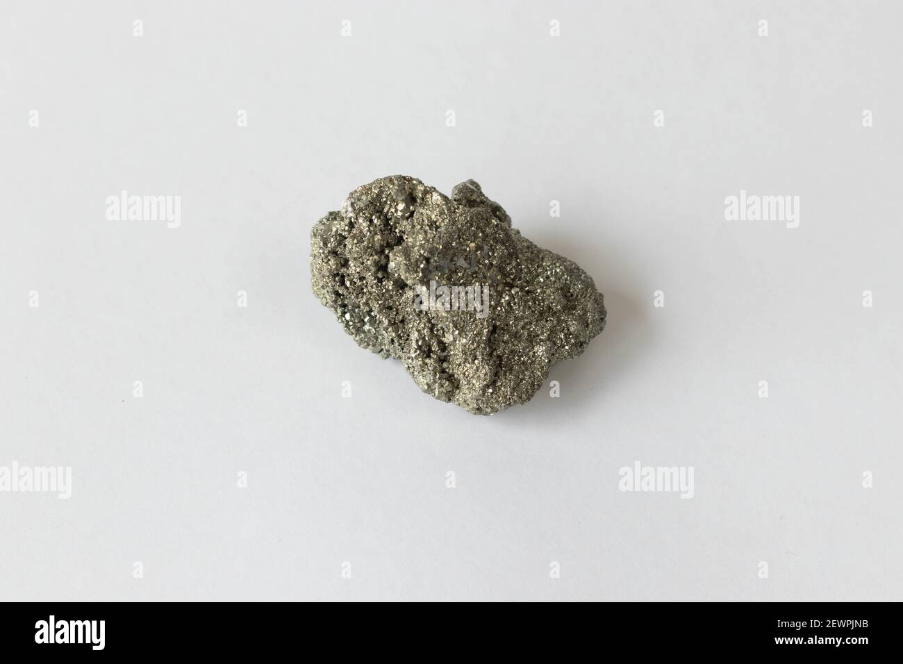 A pyrite stone isolated on Stock Photo - Alamy