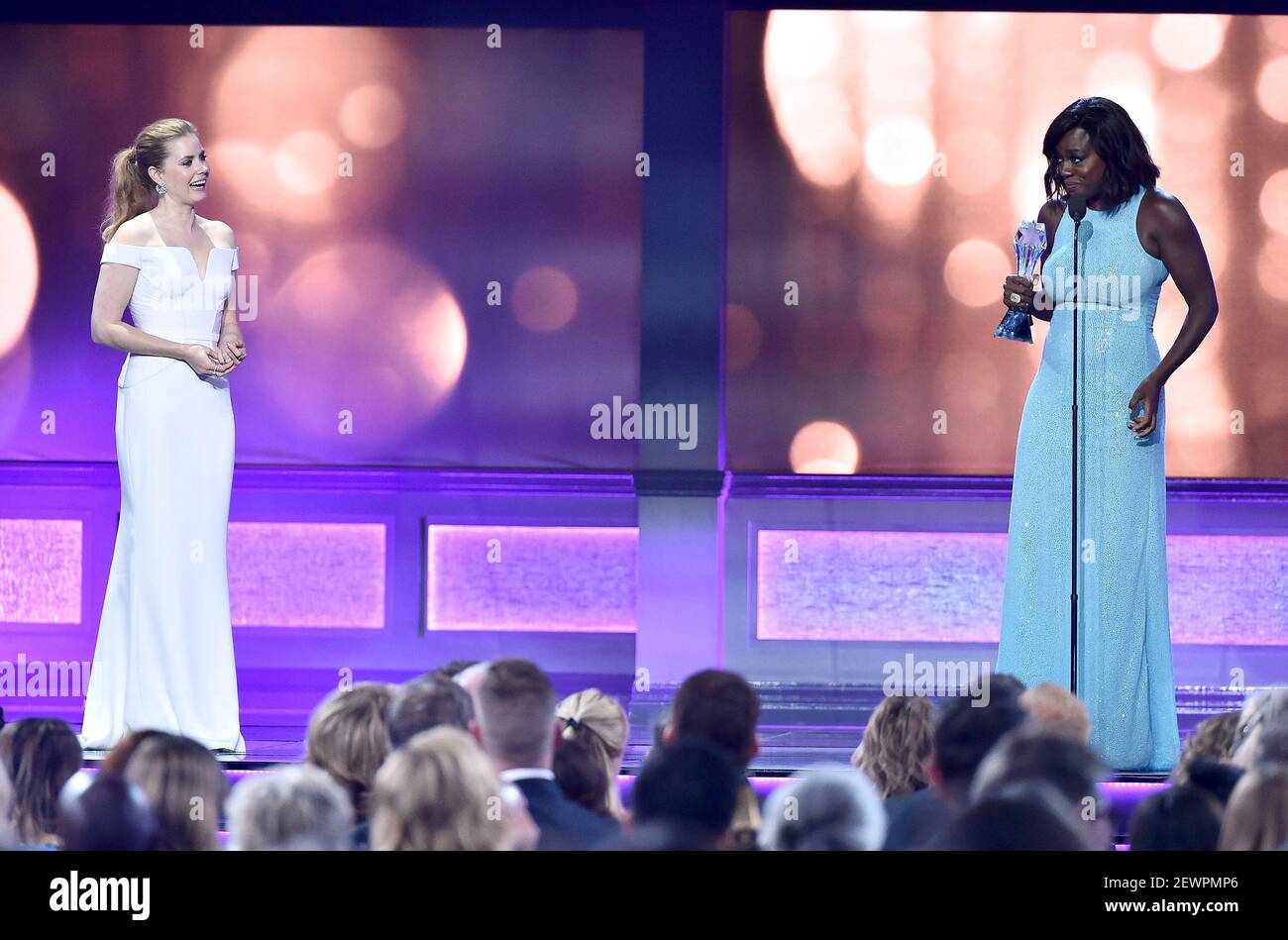 SANTA MONICA, CA - DECEMBER 11: Actress Viola Davis (R) accepts the # ...