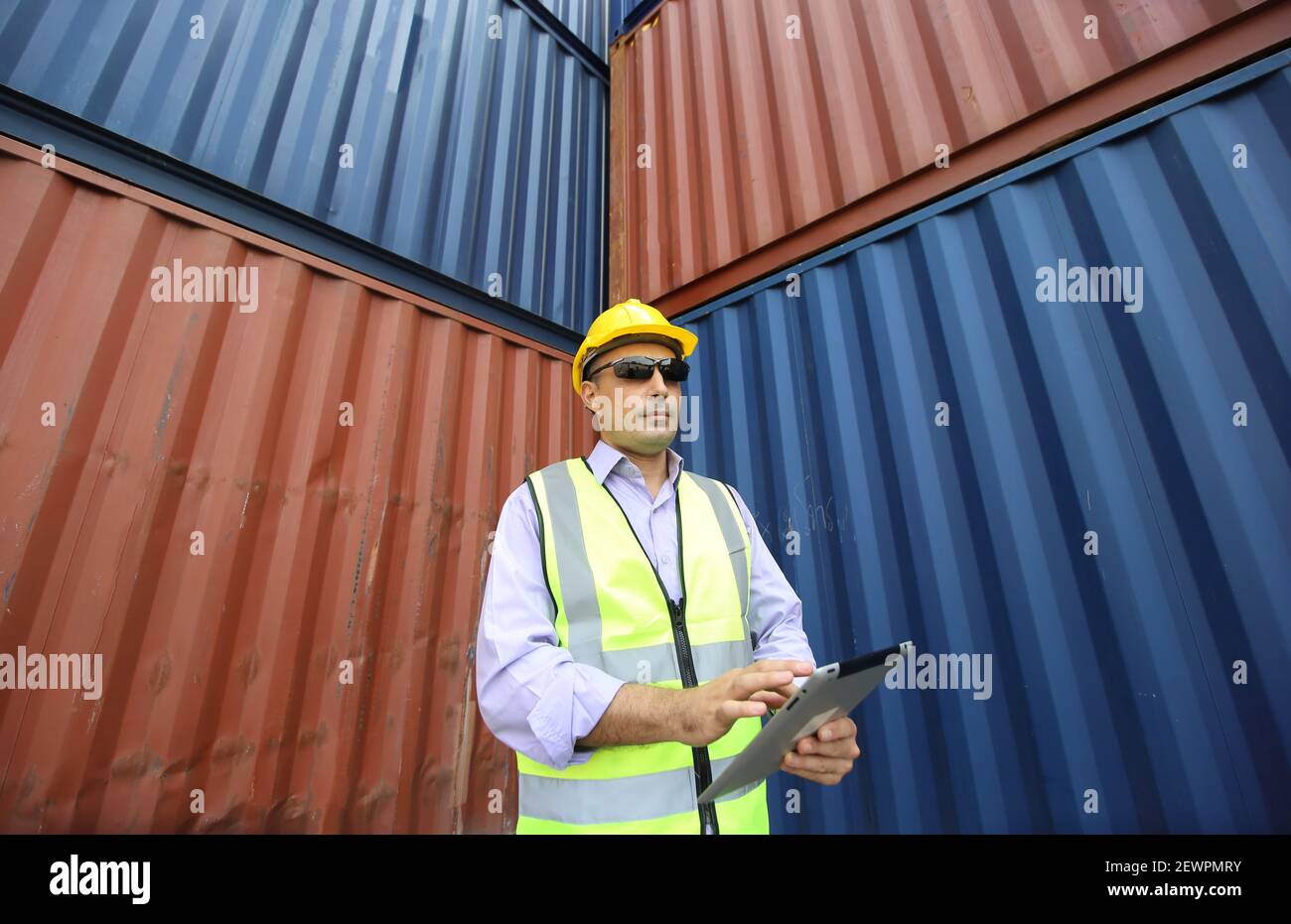 supervisor checking and control loading Containers box from Cargo at ...