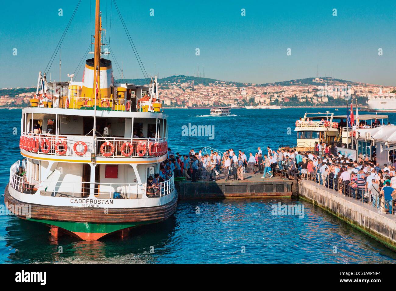 Istanbul, Istanbul Province, Turkey. Commuters boarding ferries at the ...