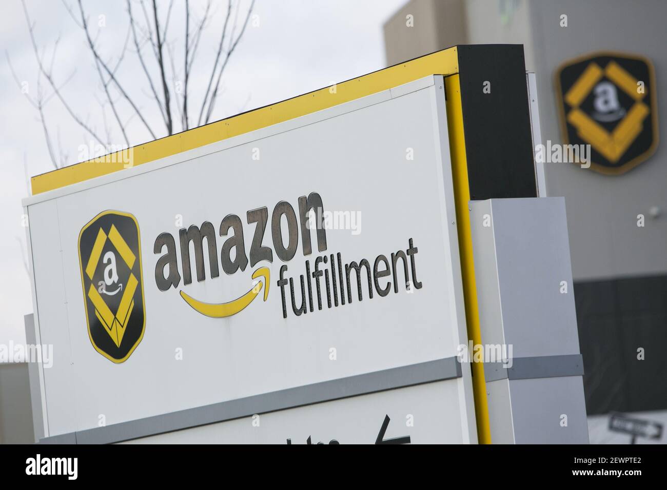 A logo sign outside of an Amazon Fulfillment center in Robbinsville ...