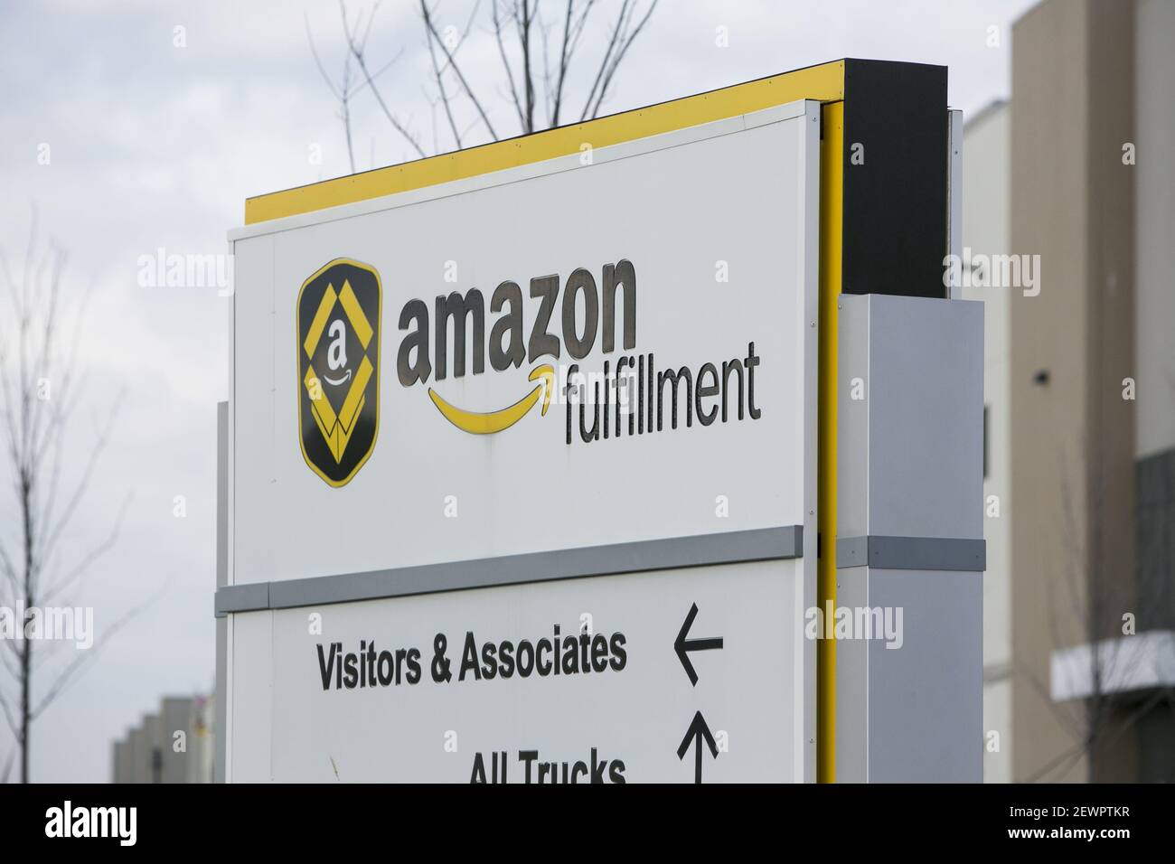 A logo sign outside of an Amazon Fulfillment center in Robbinsville ...