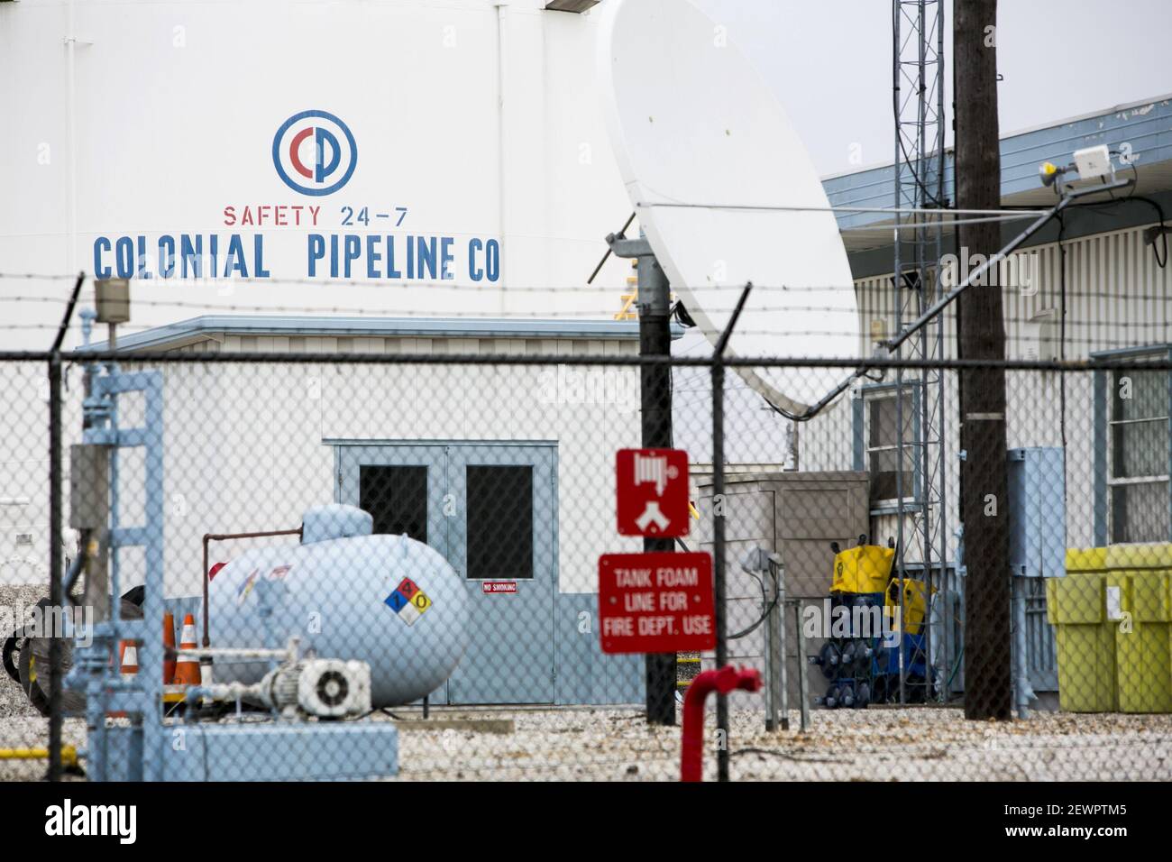 A logo sign outside of a Colonial Pipeline Company facility in ...