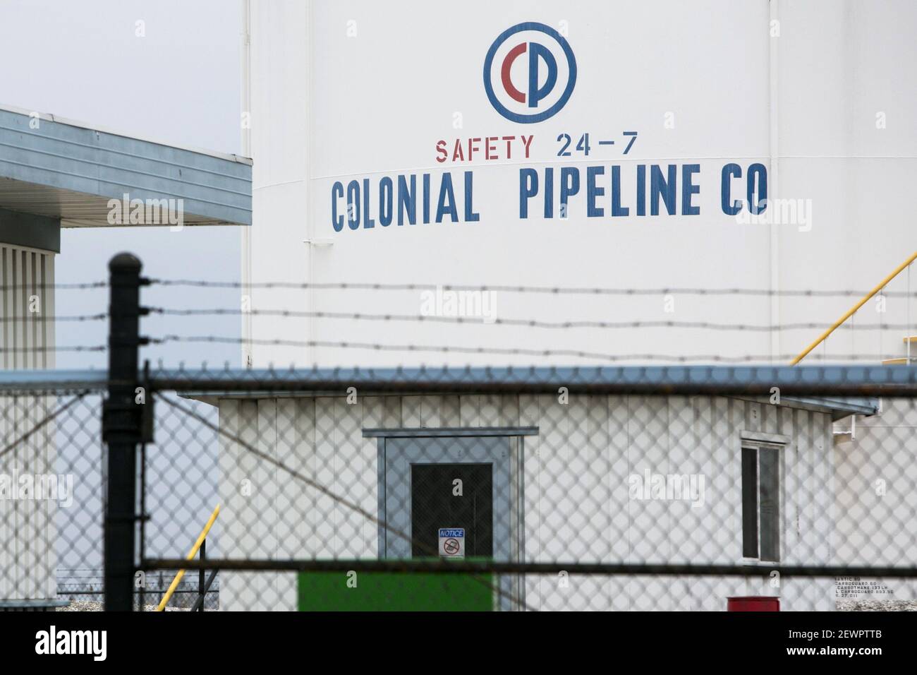A logo sign outside of a Colonial Pipeline Company facility in ...