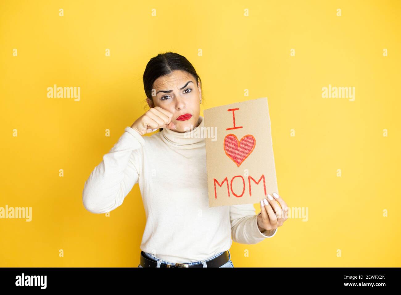 Beautiful woman celebrating mothers day holding poster love mom message ...