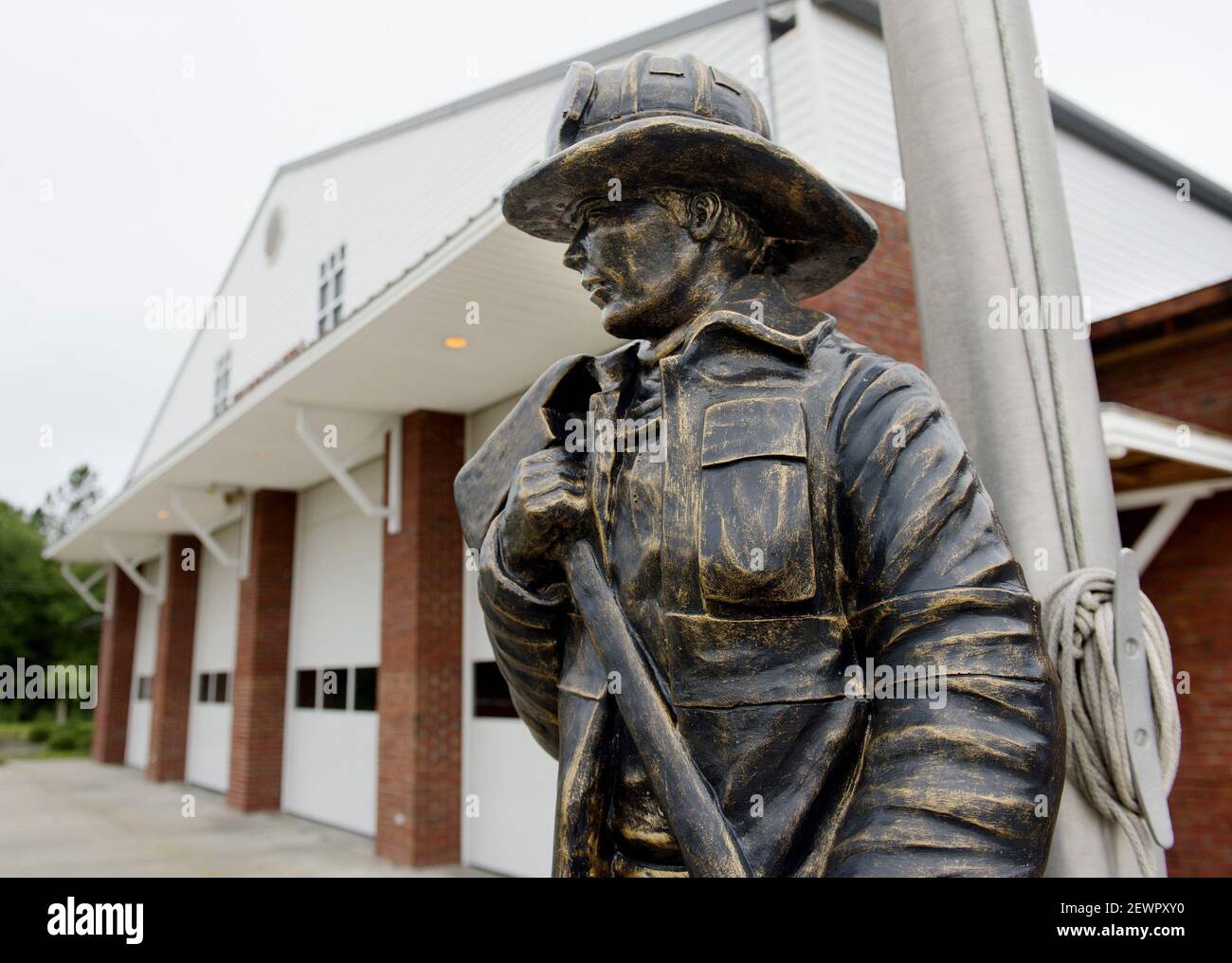 A firefighter memorial statue resides outside the Waycross, Ga., fire ...