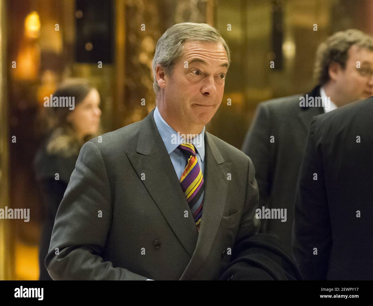 British politician Nigel Farage is seen in the lobby of Trump Tower in ...