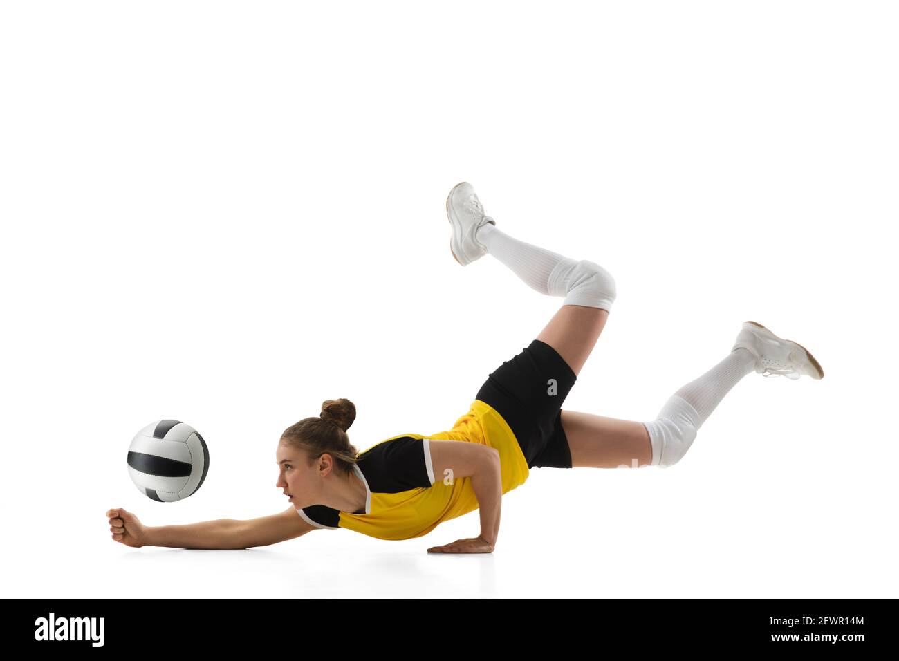 Catching. Young female volleyball player isolated on white studio ...