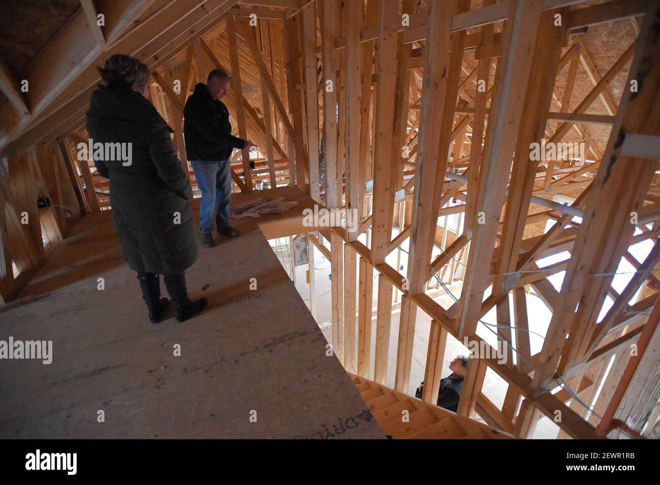 Suzanne Swisher and Kiere DeGrandchamp talk on the second floor while ...